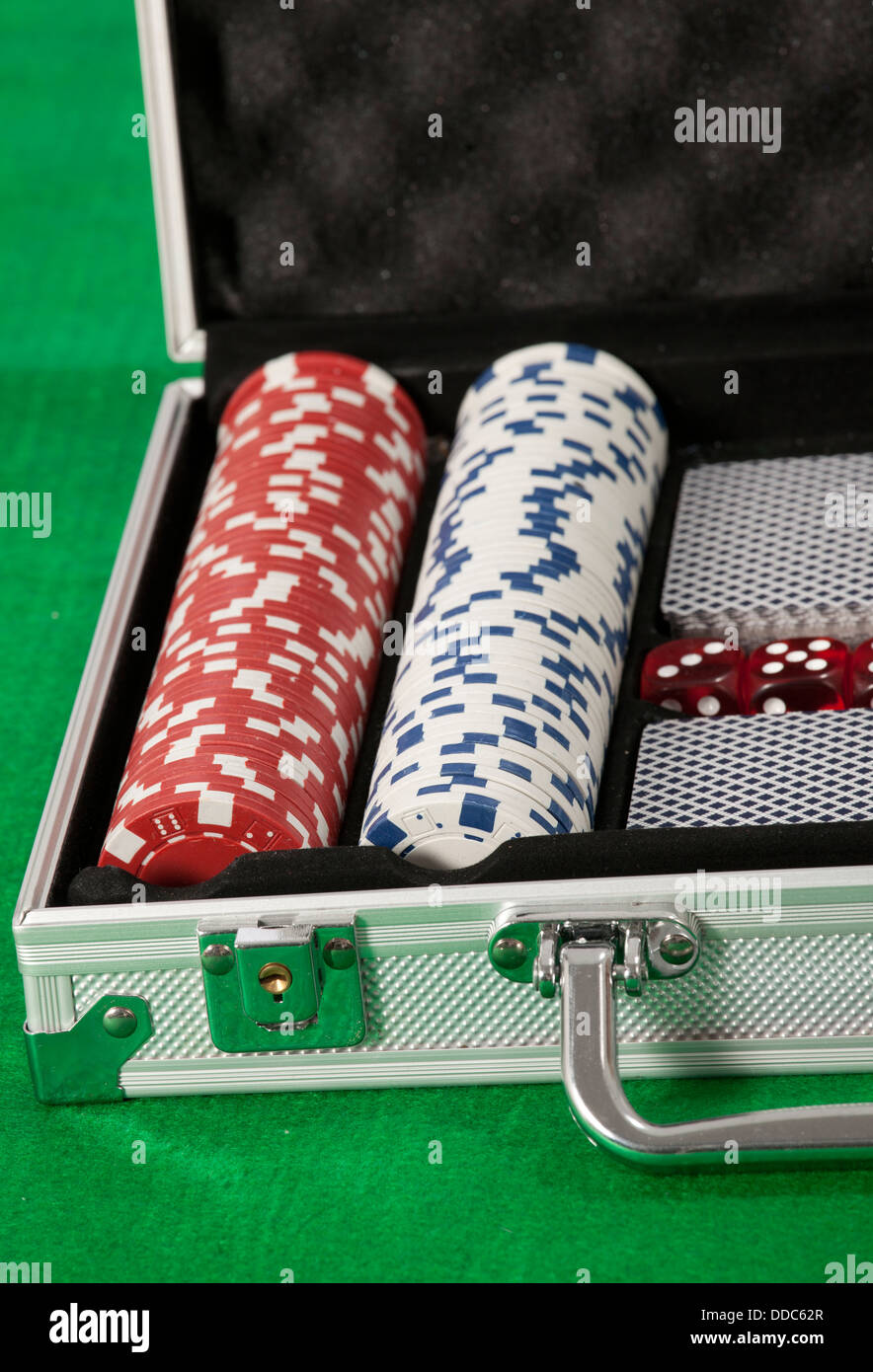 poker chips and cards in a briefcase Stock Photo - Alamy