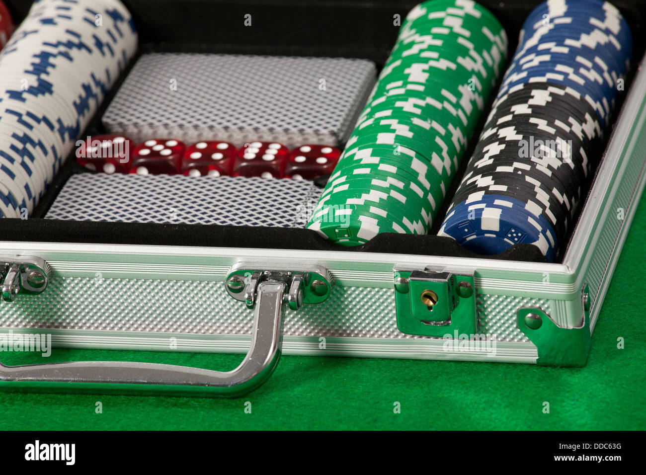 poker chips and cards in a briefcase Stock Photo - Alamy
