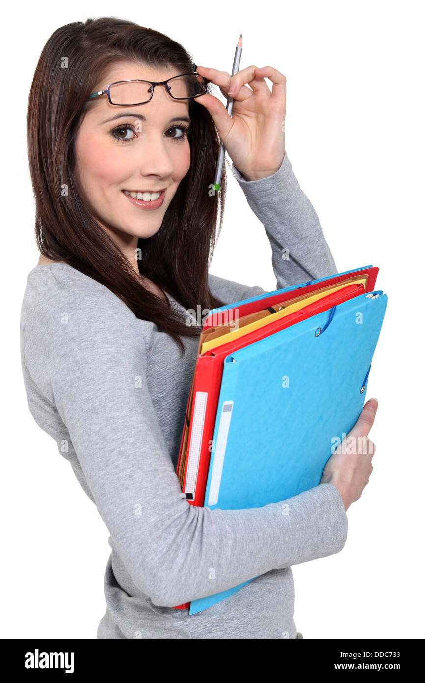 Woman with glasses and folders Stock Photo - Alamy