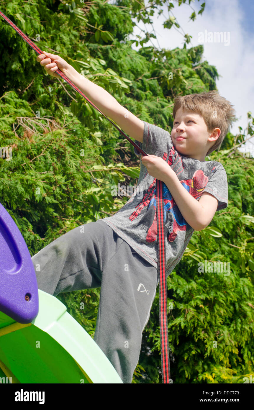 Climbing up a slide hi-res stock photography and images - Alamy