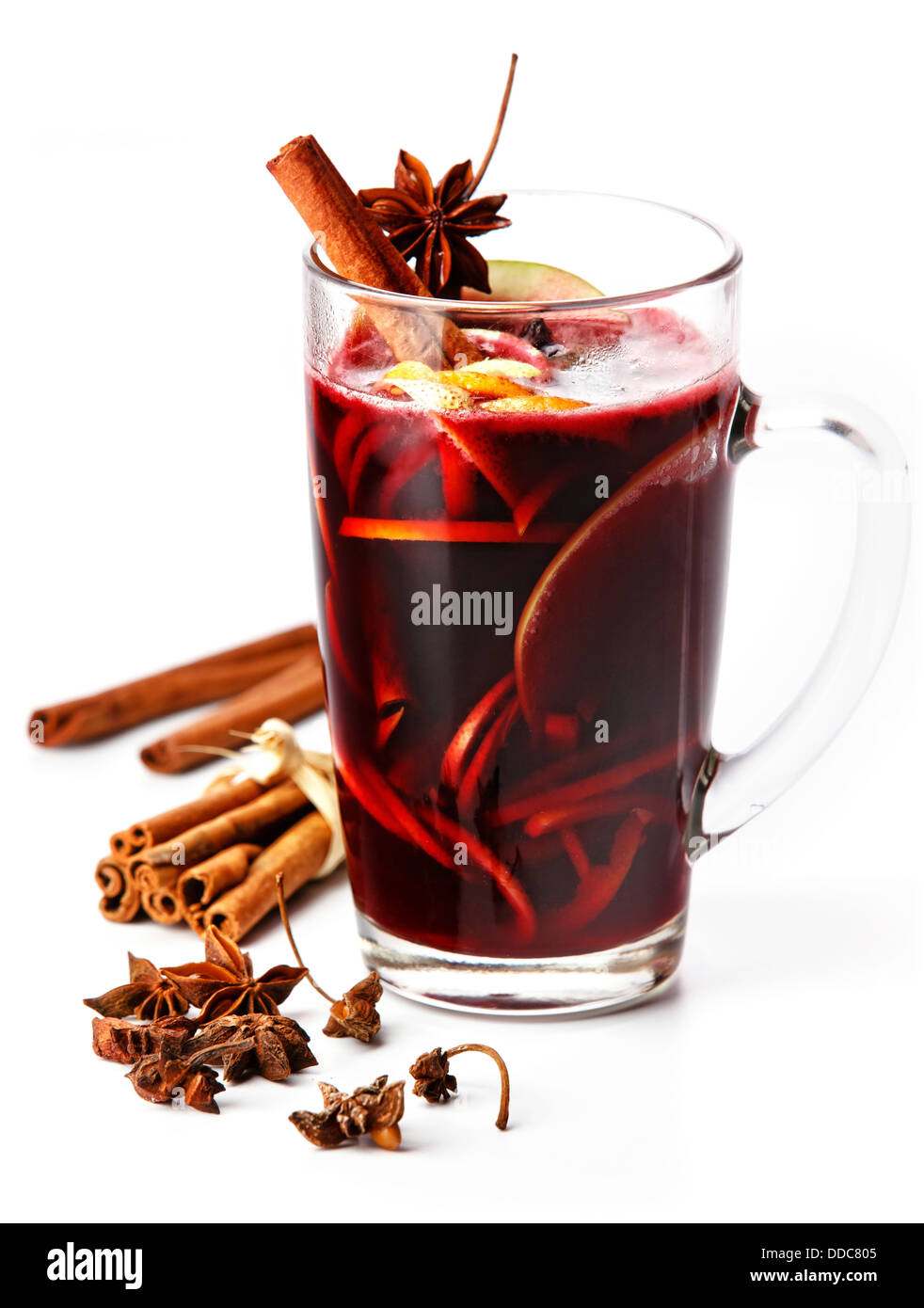 Cup of hot wine with spices on white background Stock Photo - Alamy