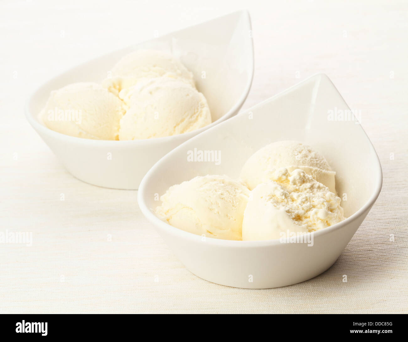 Vanilla ice cream on white background Stock Photo - Alamy