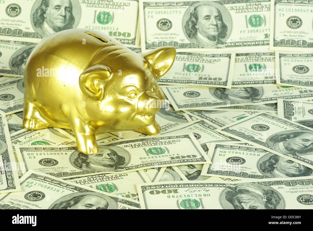 gold piggy bank Stock Photo - Alamy