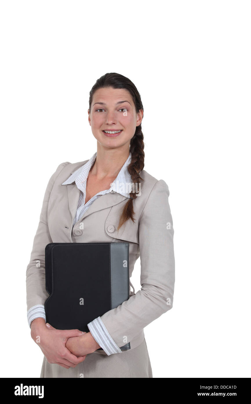 Stylish woman holding a folder Stock Photo - Alamy
