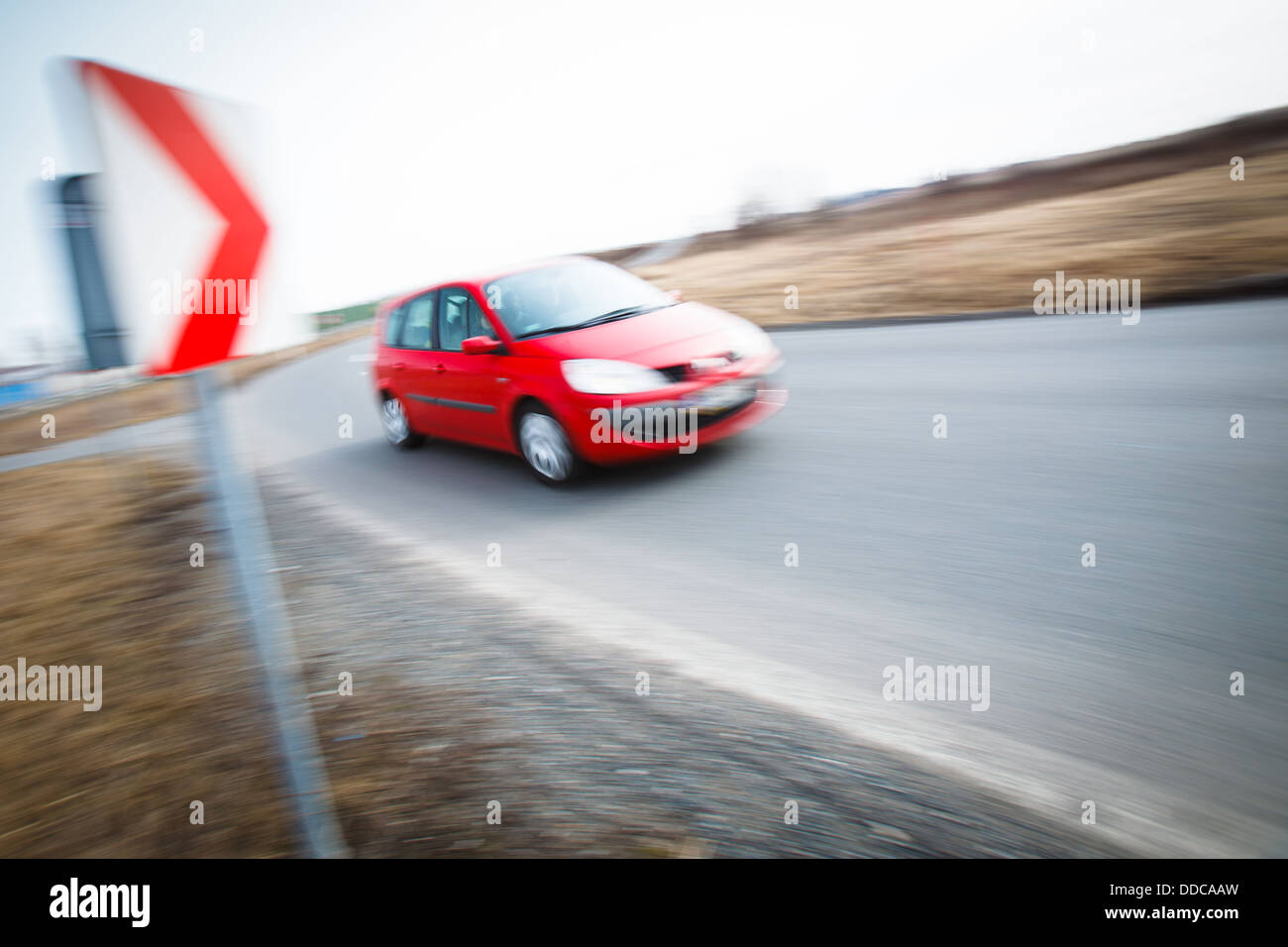 Traffic concept: car driving fast through a sharp turn Stock Photo - Alamy