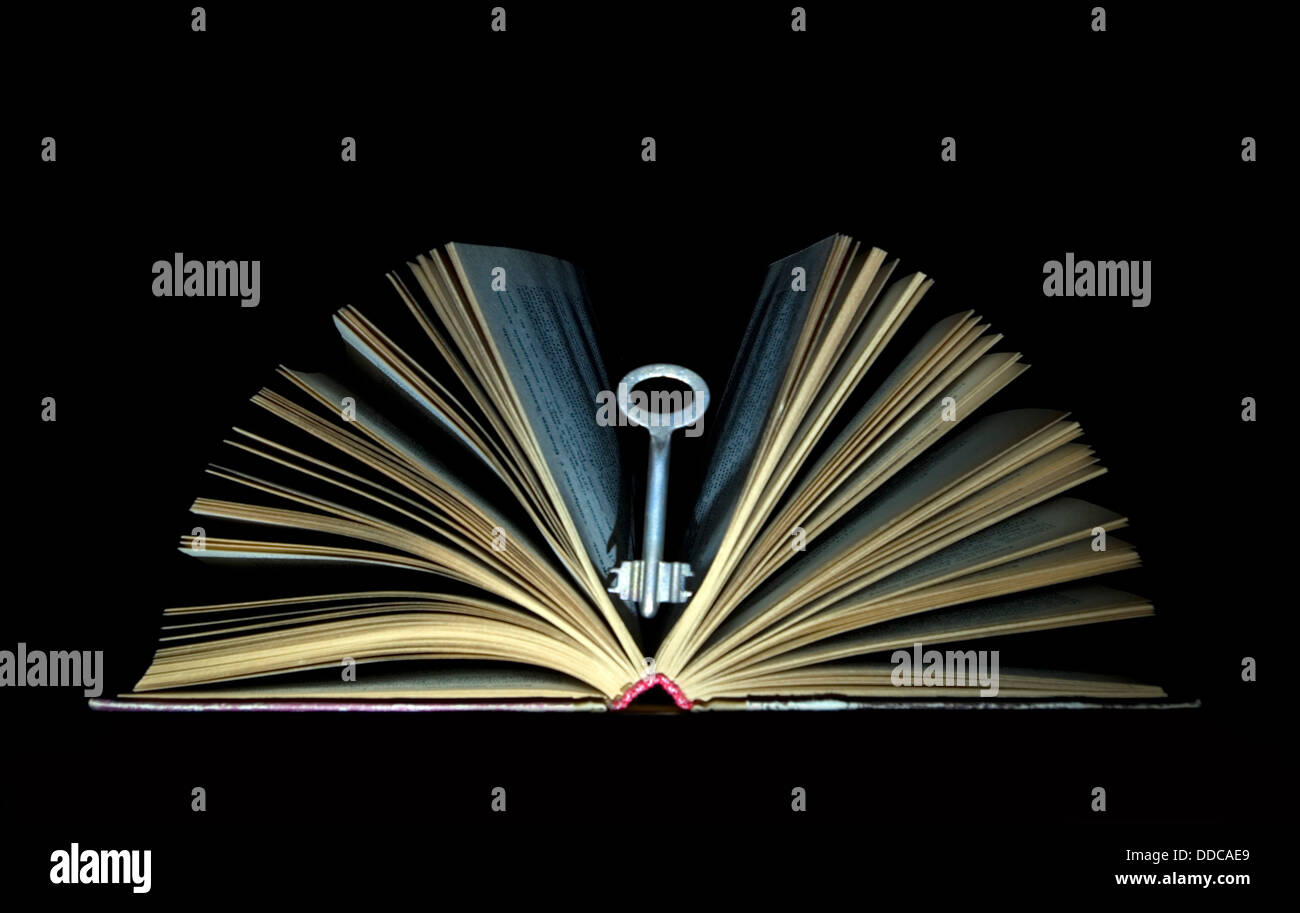 Key and books Stock Photo - Alamy