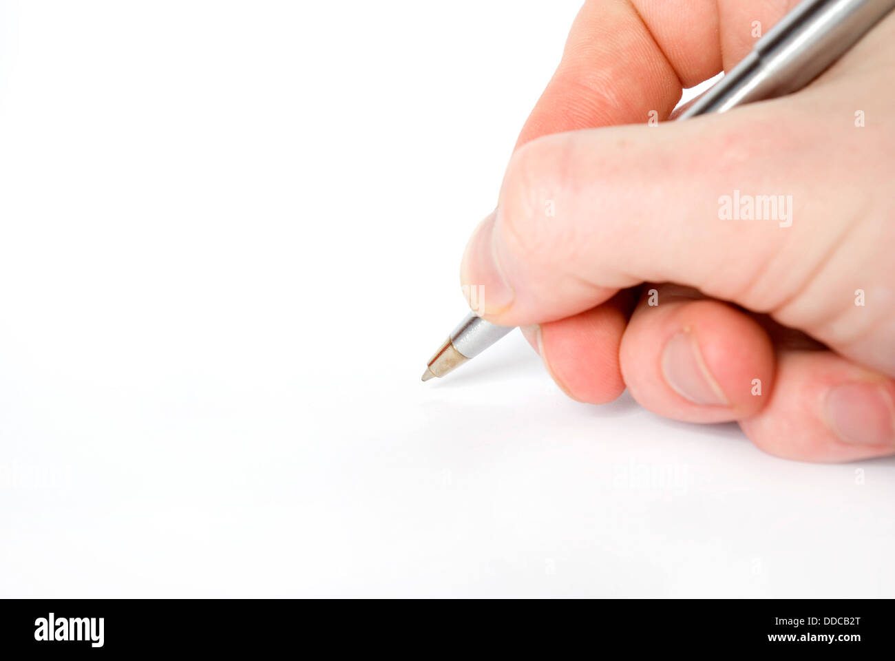 Hand holding pen Stock Photo - Alamy