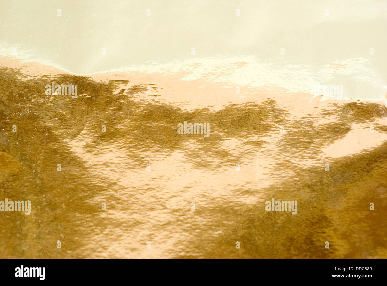 Gold mottled background hi-res stock photography and images - Alamy
