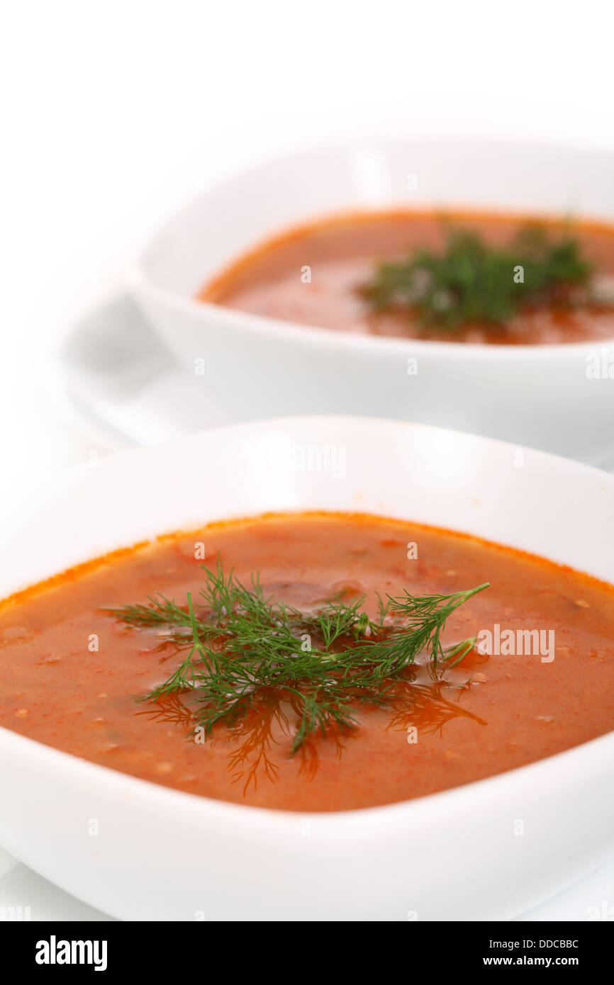 Image of bowls of hot red soup isolated Stock Photo - Alamy