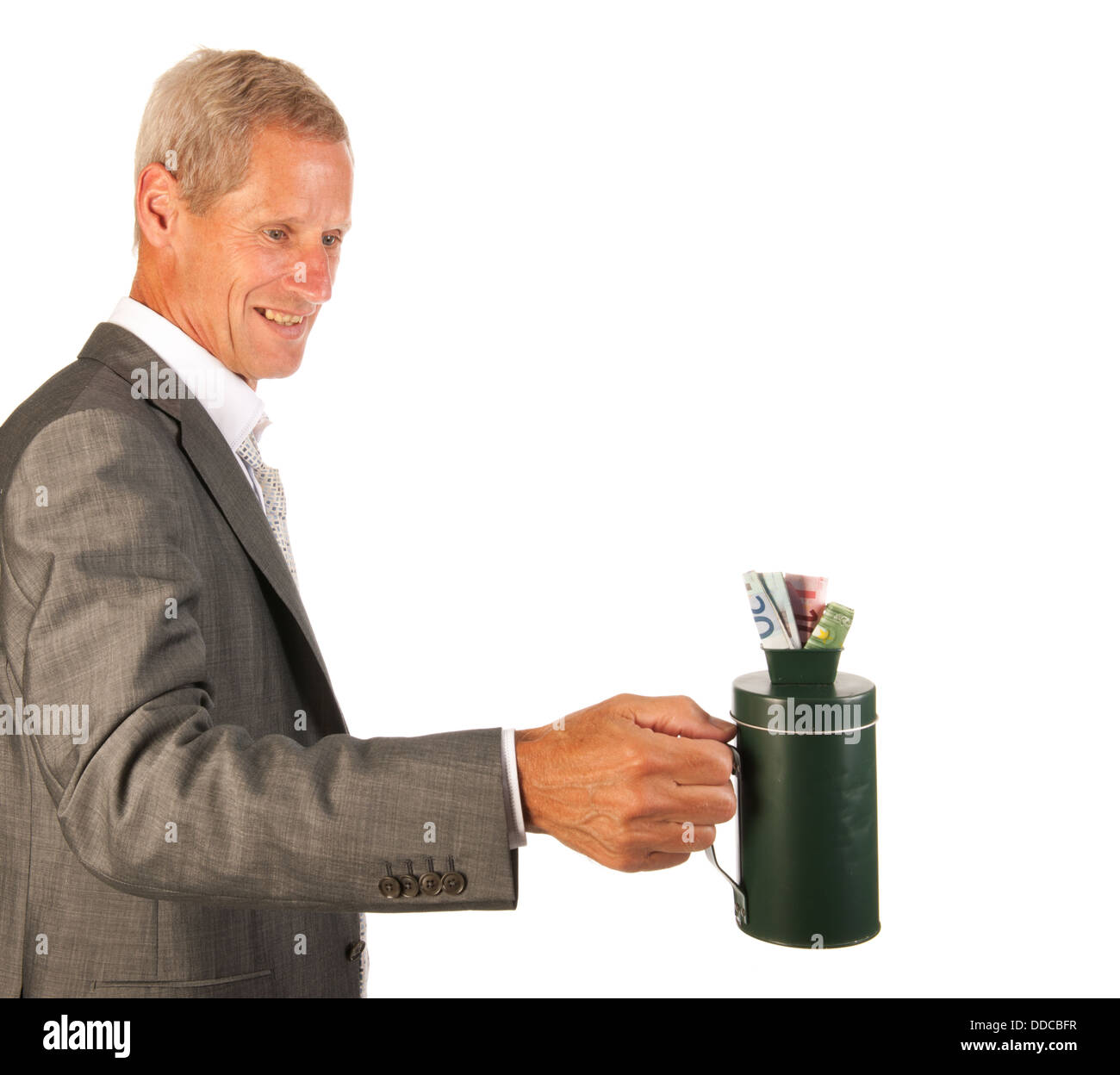 Senior business man collecting money Stock Photo - Alamy