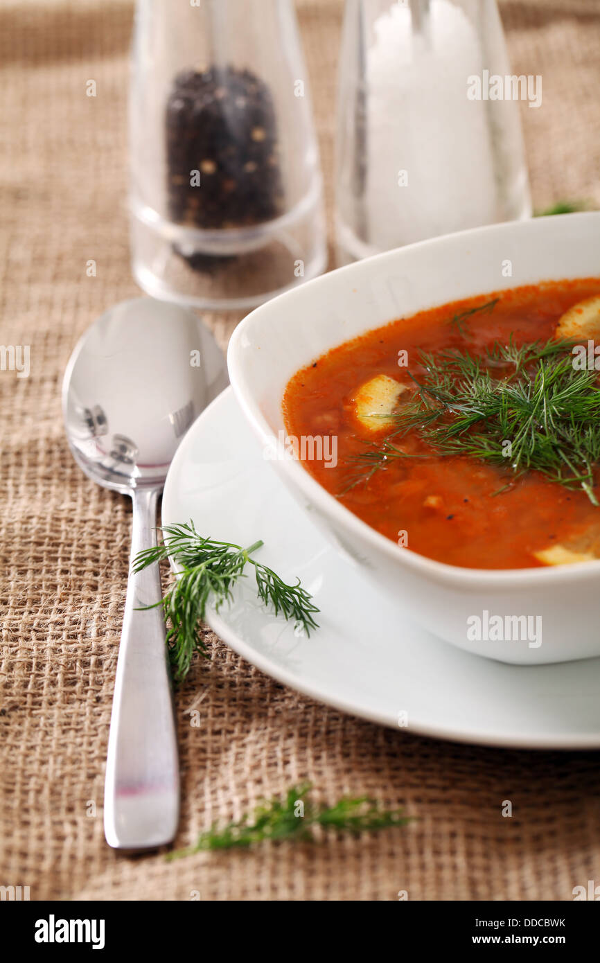 Image of bowl of hot red soup served Stock Photo - Alamy
