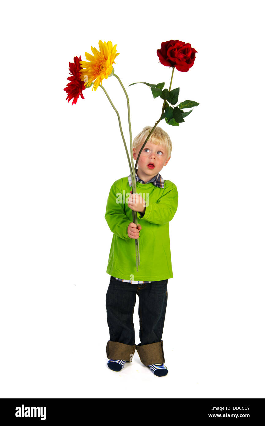 Little boy with big flowers Stock Photo - Alamy