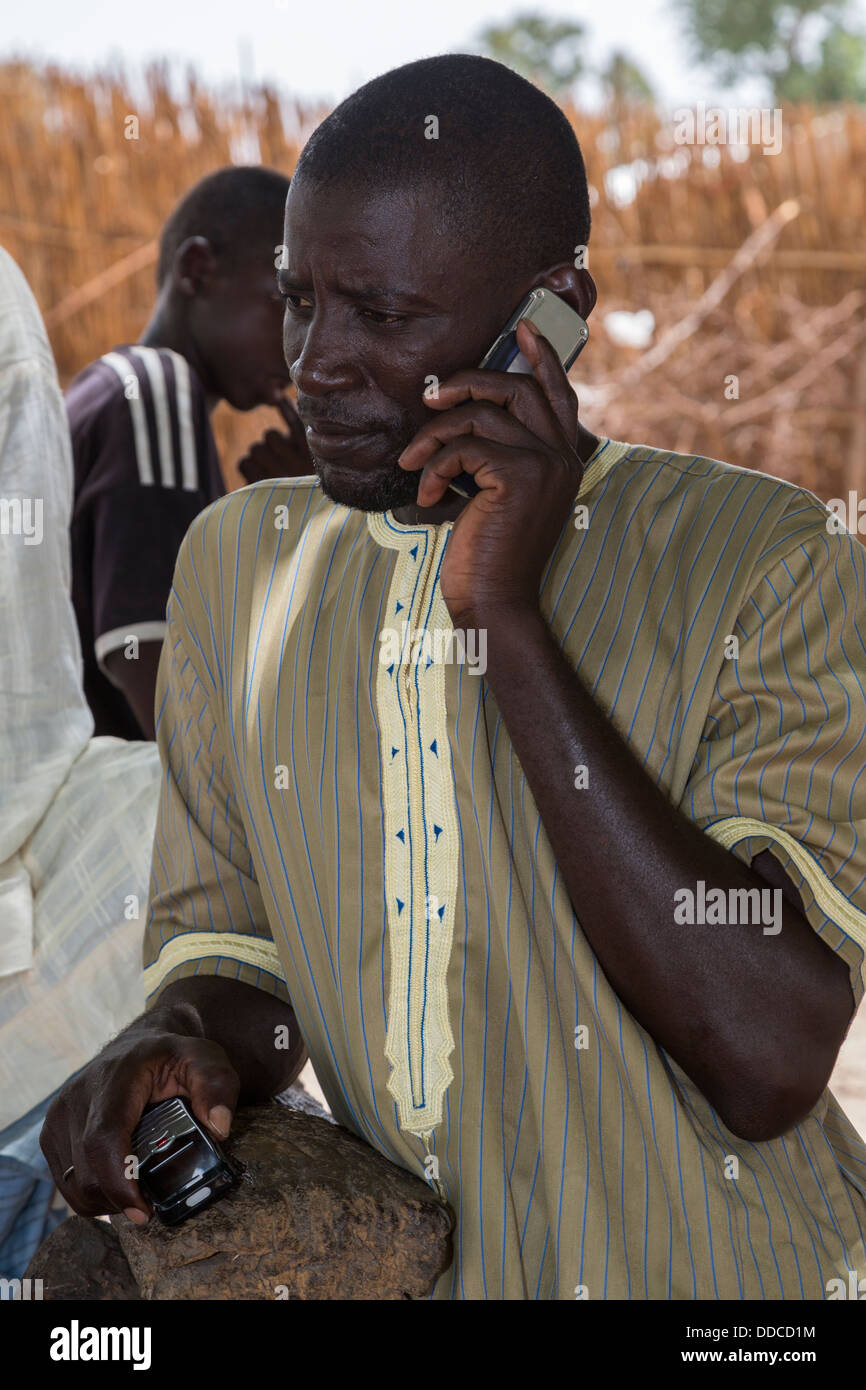 Cell phone africa village hi-res stock photography and images - Alamy