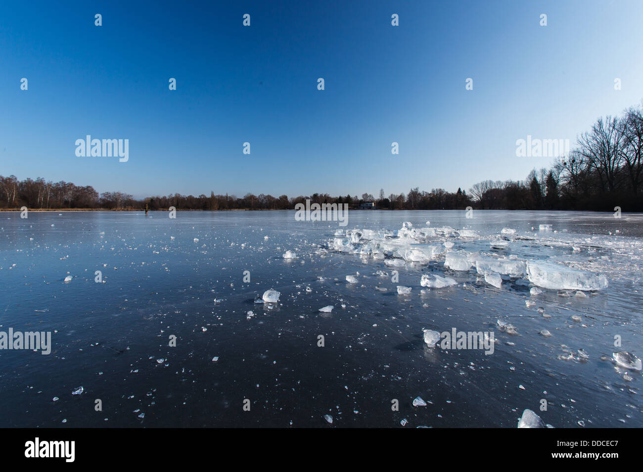 Freezing winter temperatures: block of ice lying on the surface Stock ...