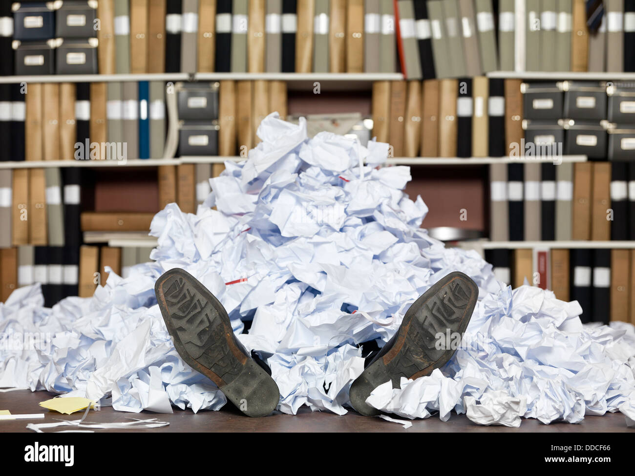 Buried under paper hi-res stock photography and images - Alamy