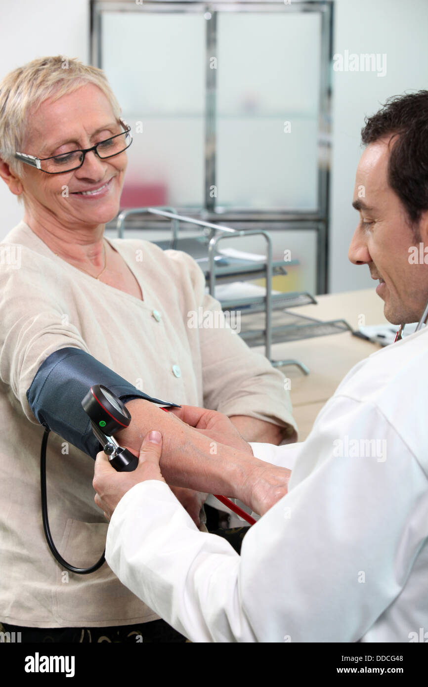 Blood pressure checked hi-res stock photography and images - Alamy