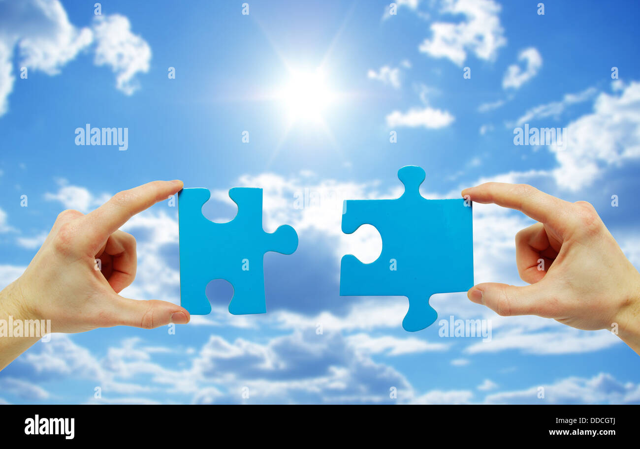 puzzle in hands Stock Photo - Alamy