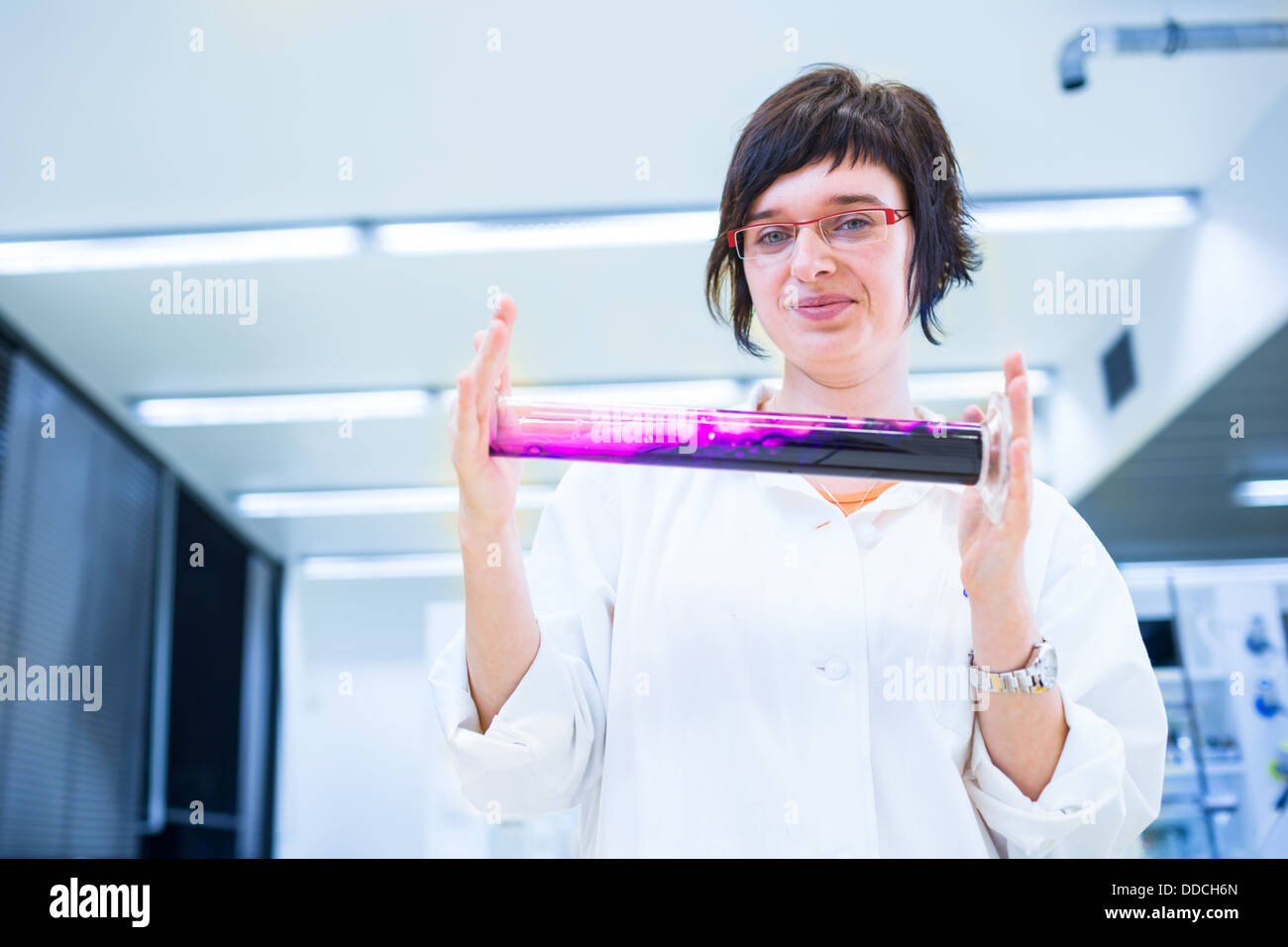 Portrait of a female researcher carrying out research Stock Photo - Alamy