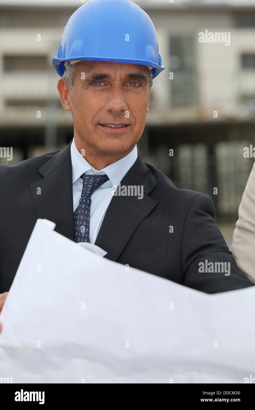 Senior architect working on-site Stock Photo - Alamy