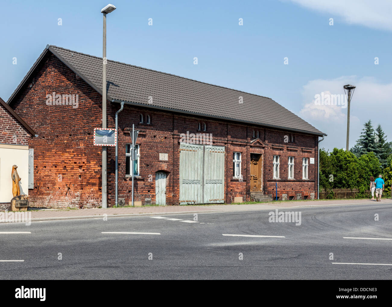 Red brick house wooden doors hi-res stock photography and images - Alamy