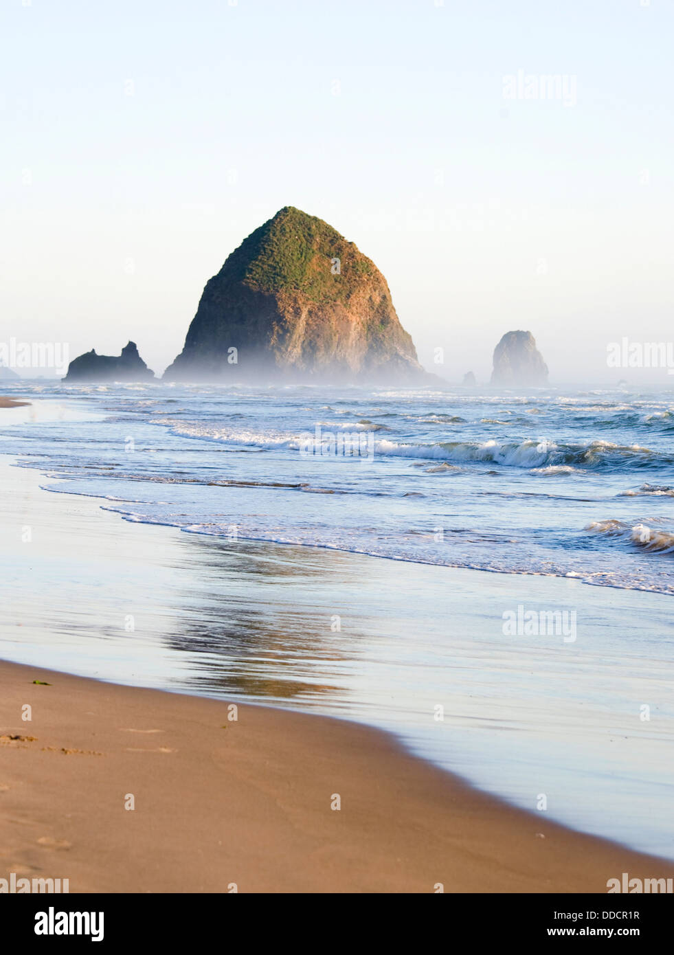 Beautiful sunny day at Haystack Rock at Cannon Beach, Oregon, US Stock ...
