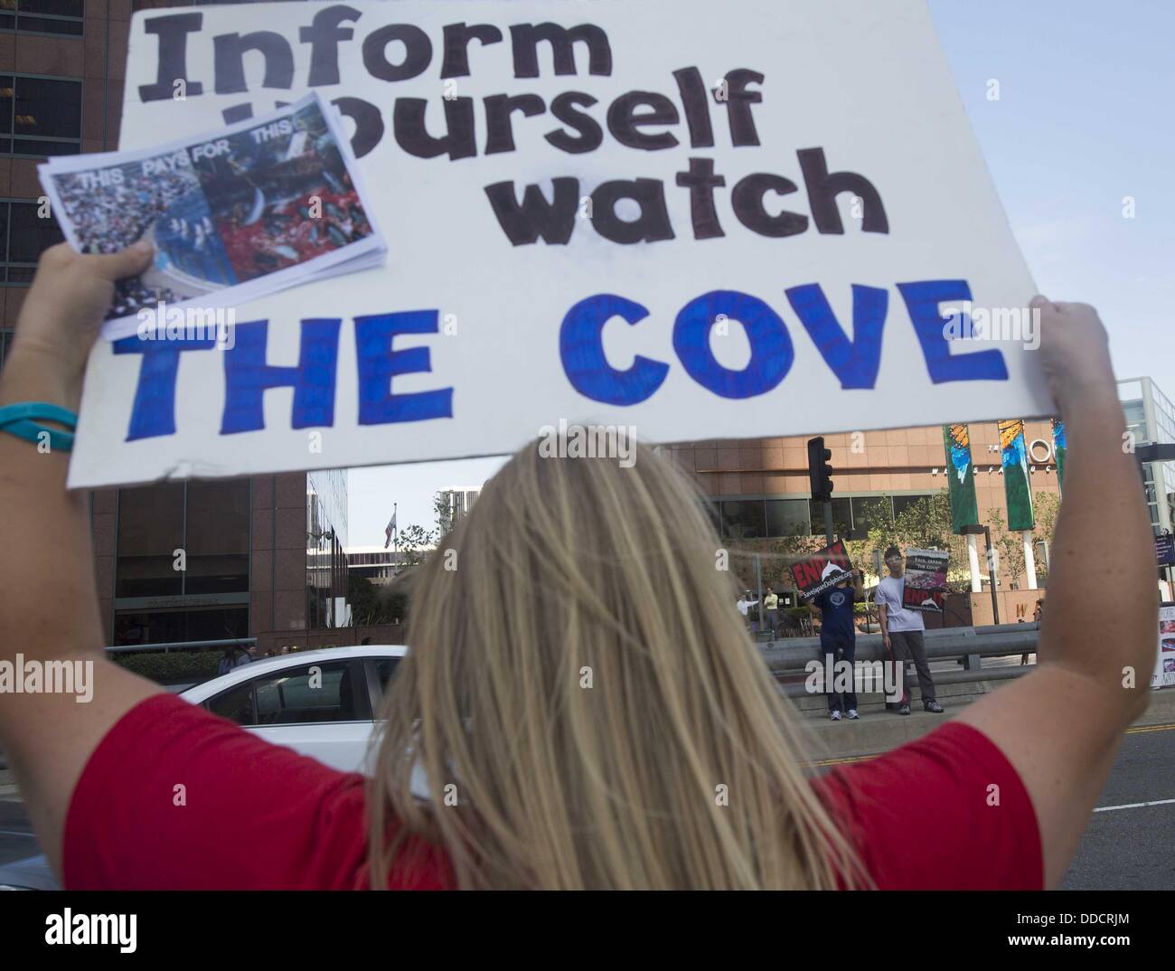 Los Angeles, California, USA. 30th Aug, 2013. Members of PETA hold ...