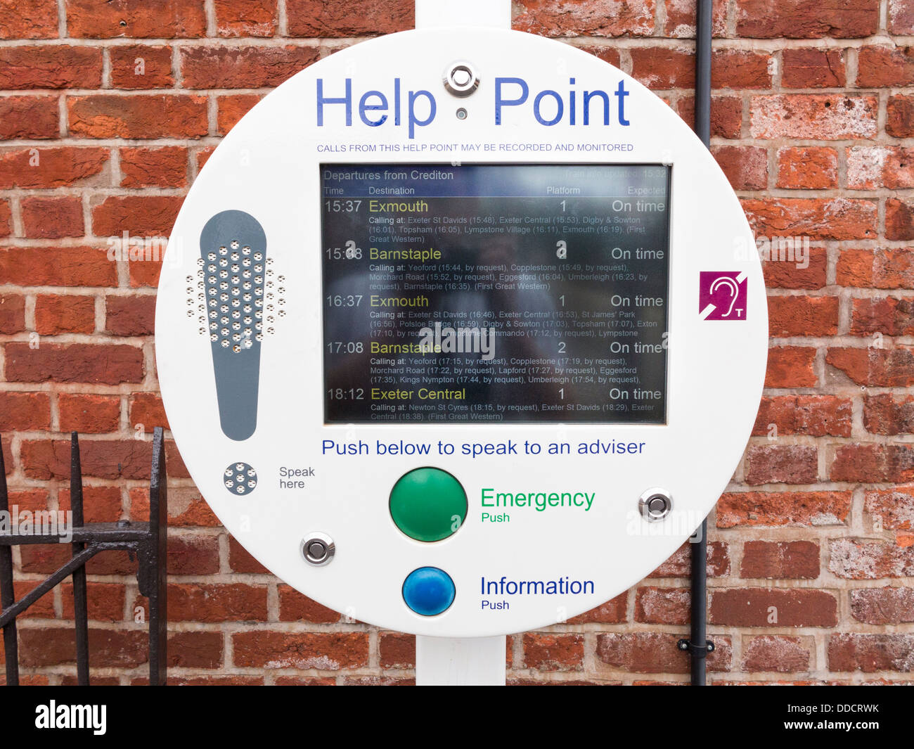 Help Point in a railway station showing train times Stock Photo - Alamy