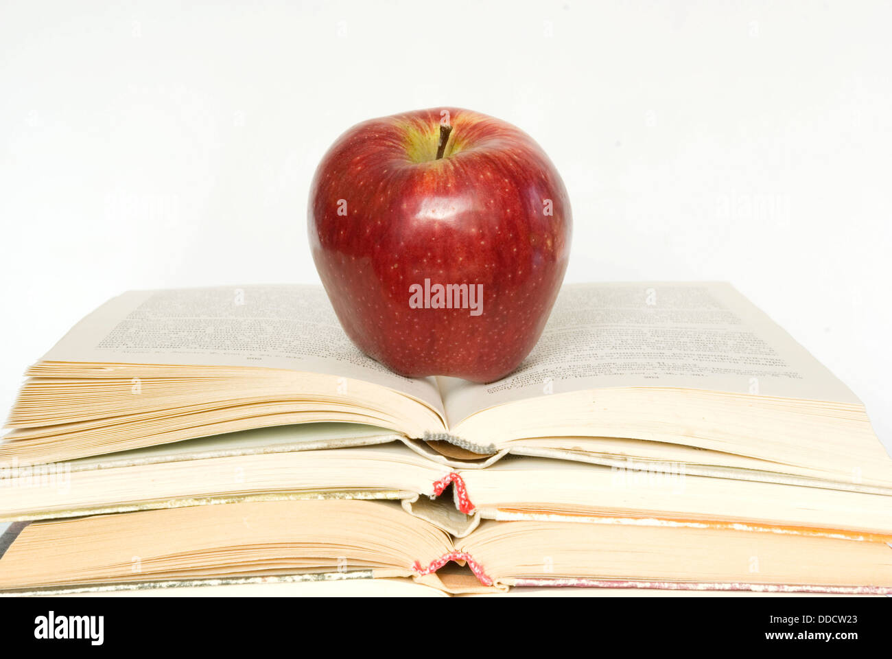 apple and books Stock Photo - Alamy