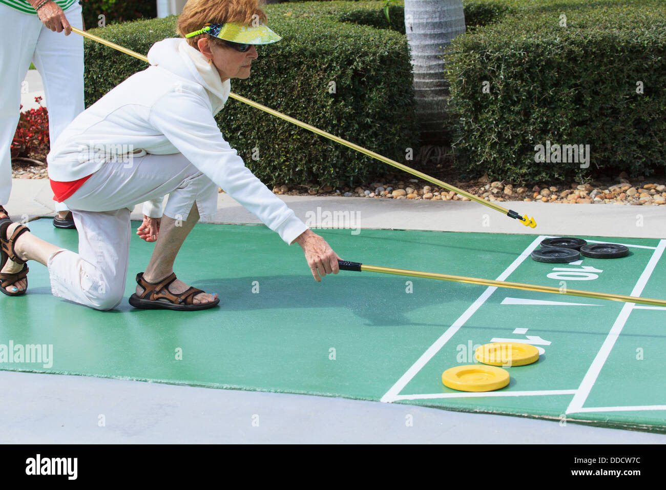 Senior women playing shuffleboard hi res stock photography and images Alamy