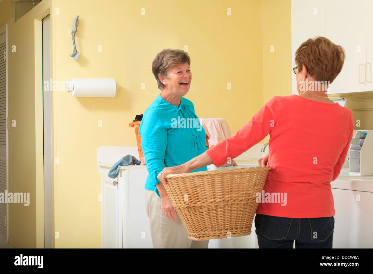 Women in a laundry hi-res stock photography and images - Alamy