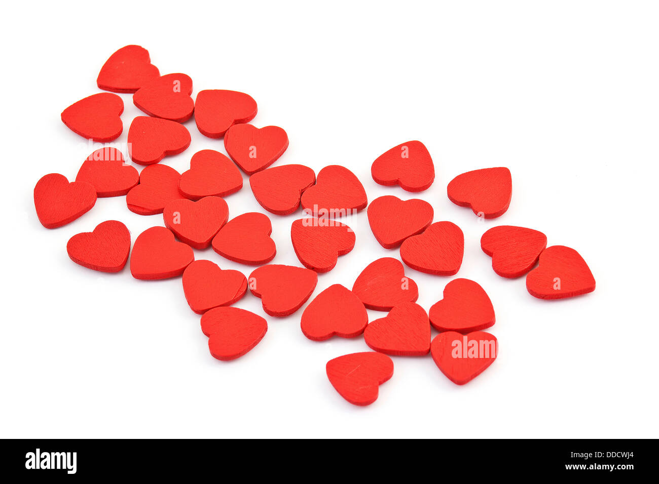 Small hearts on white background Stock Photo - Alamy