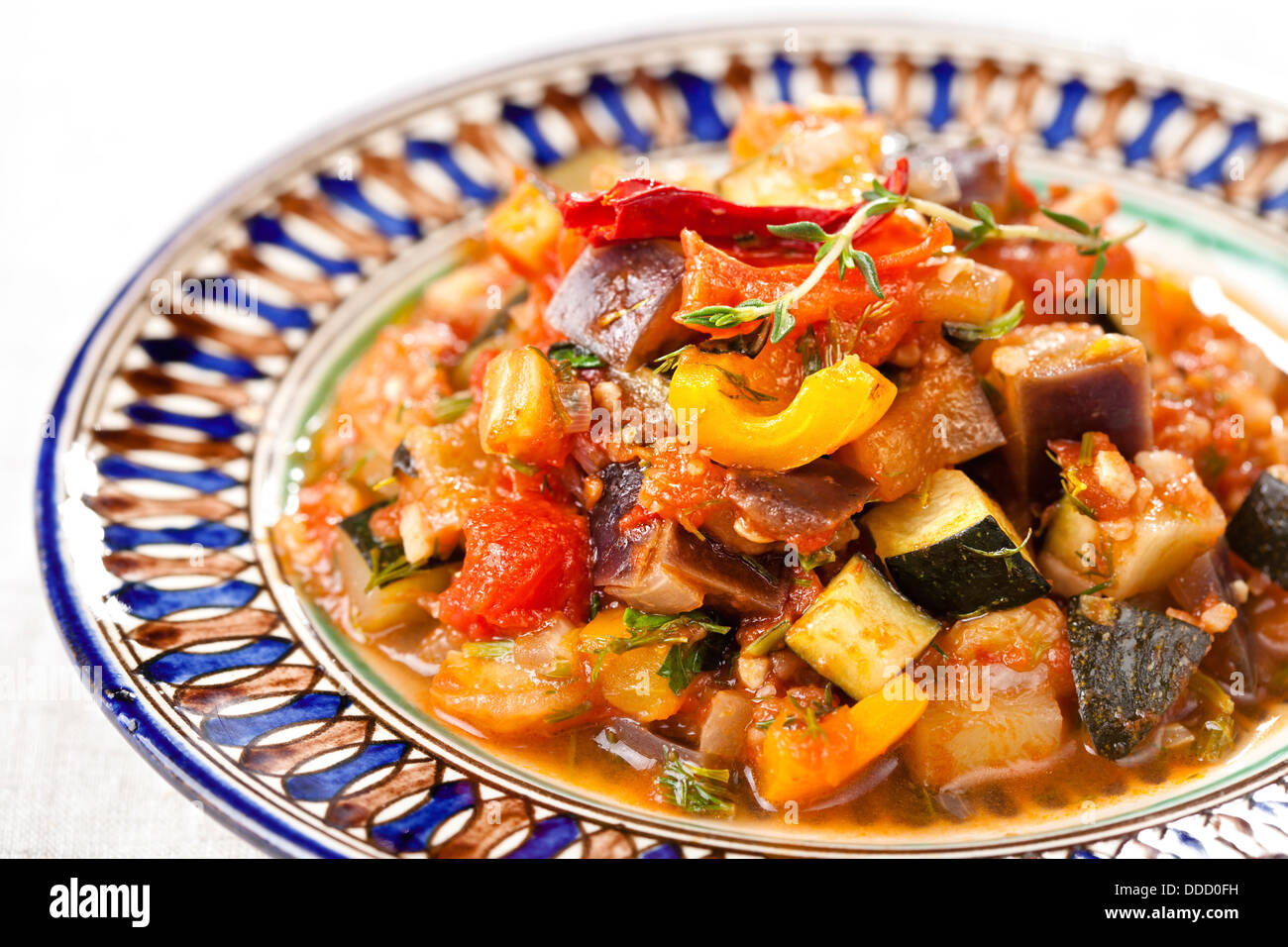 Traditional vegetable ratatouille on white background Stock Photo - Alamy