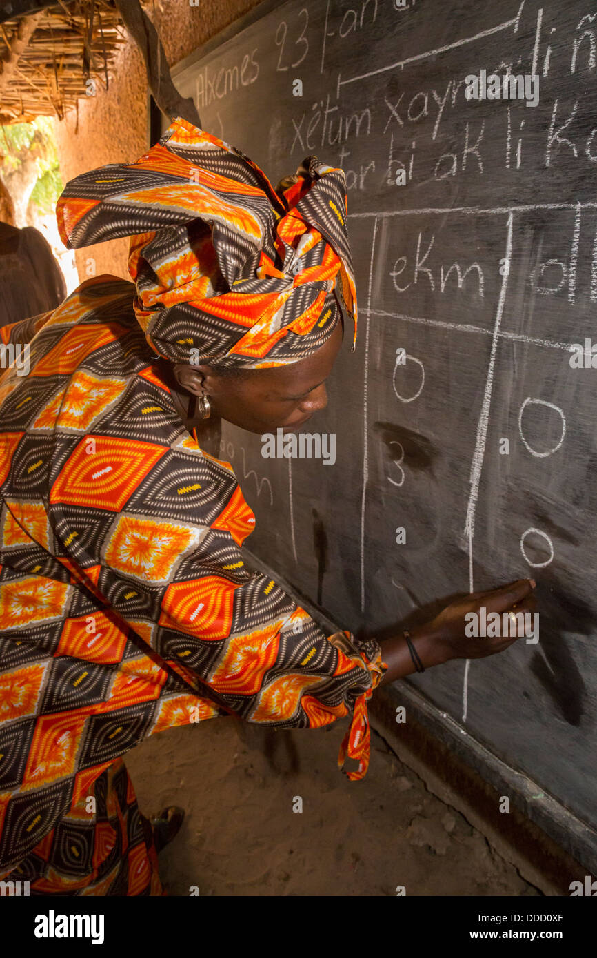Student in Adult Literacy Class, Santhiou Mboutou Village, Senegal. An ...
