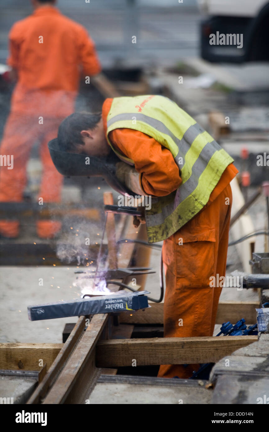 Man wearing welding helmet welding hi-res stock photography and images ...