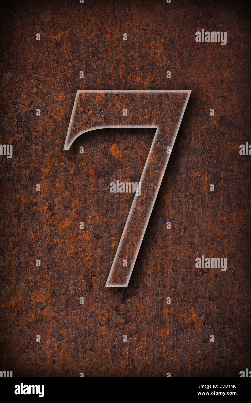 number seven on rusty iron brown background Stock Photo - Alamy
