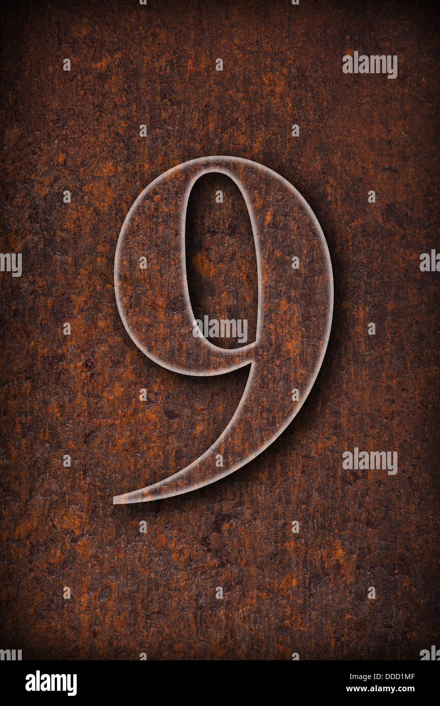 number nine on rusty iron brown background Stock Photo - Alamy