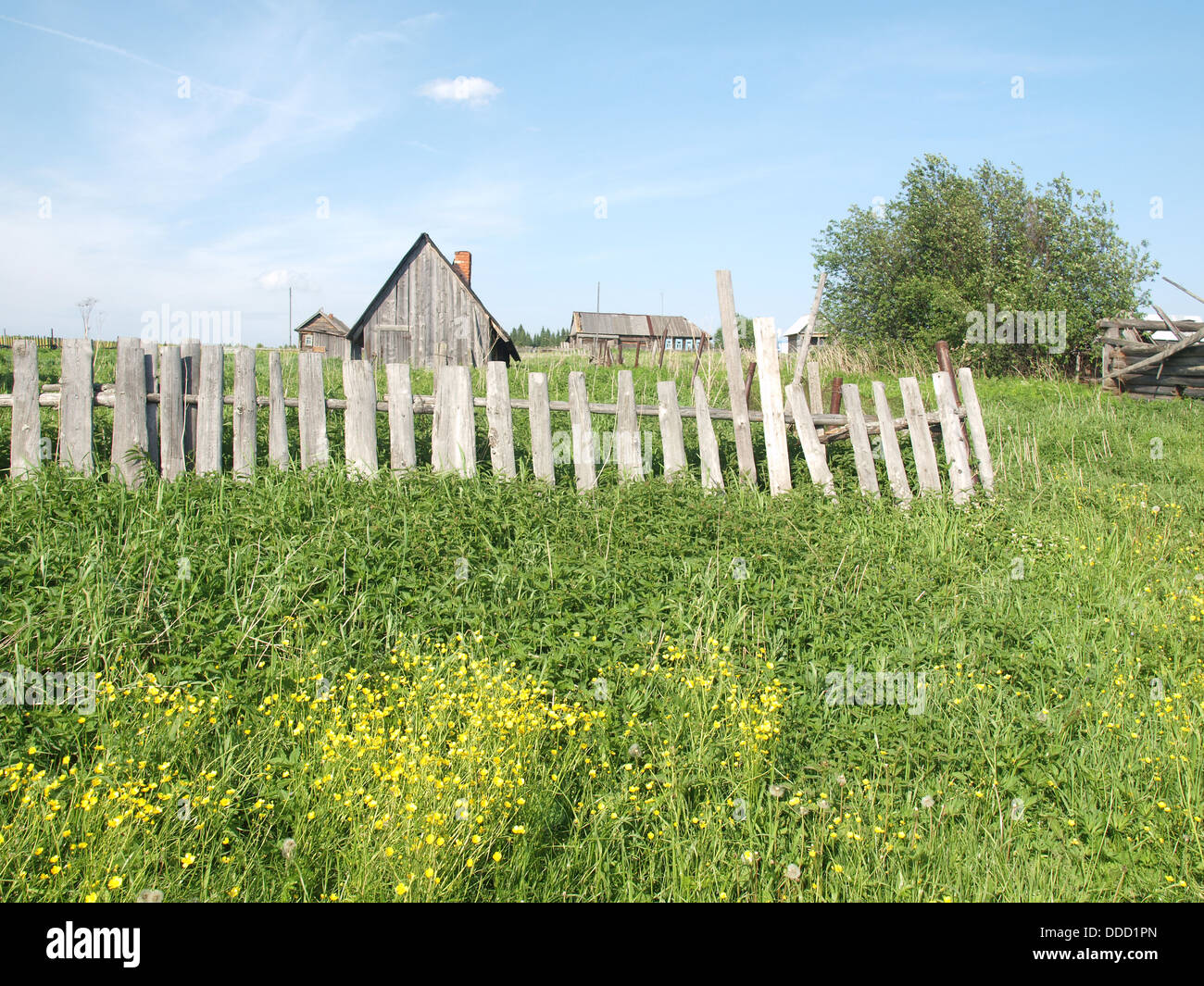 Wooden house behind a fence hi-res stock photography and images - Alamy