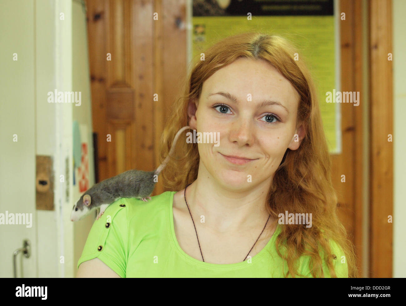 The girl with a rat on a shoulder Stock Photo - Alamy