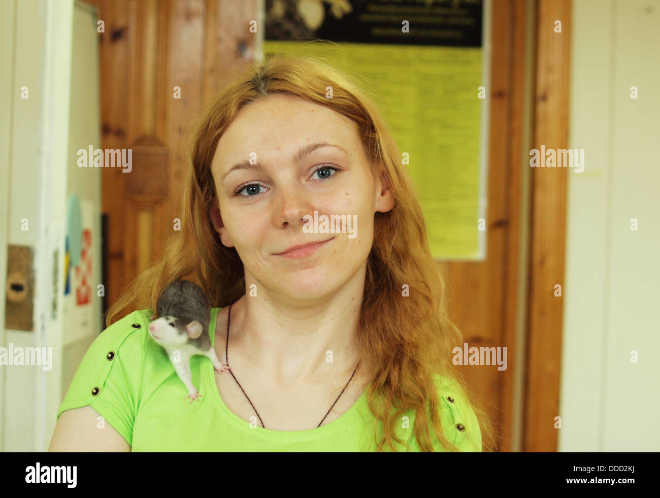 The girl with a rat on a shoulder Stock Photo - Alamy