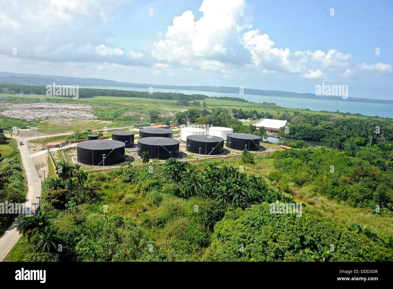Large round gas containers sit close the Caribbean shore Stock Photo ...