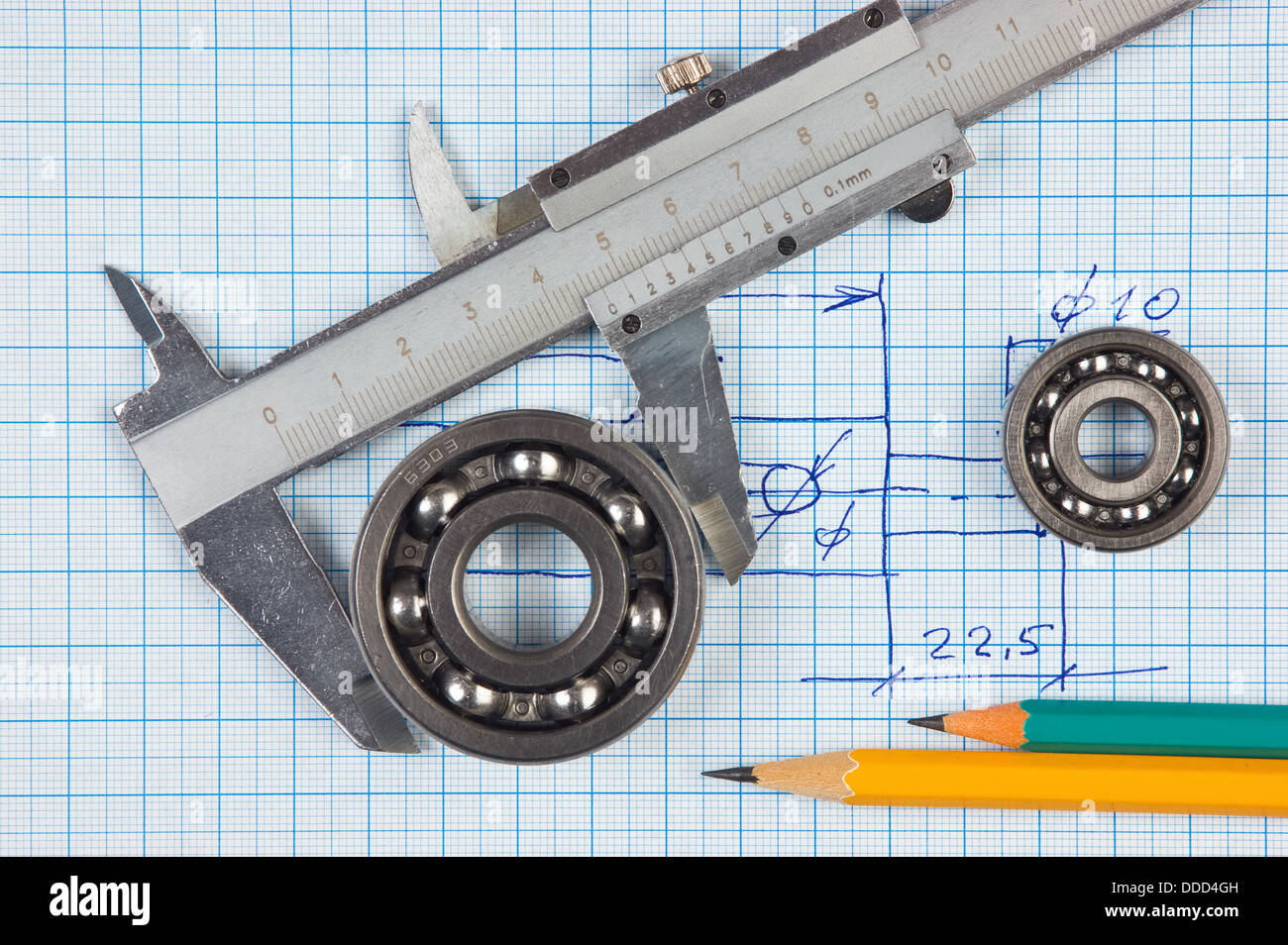technical tools on a background of graph paper Stock Photo - Alamy