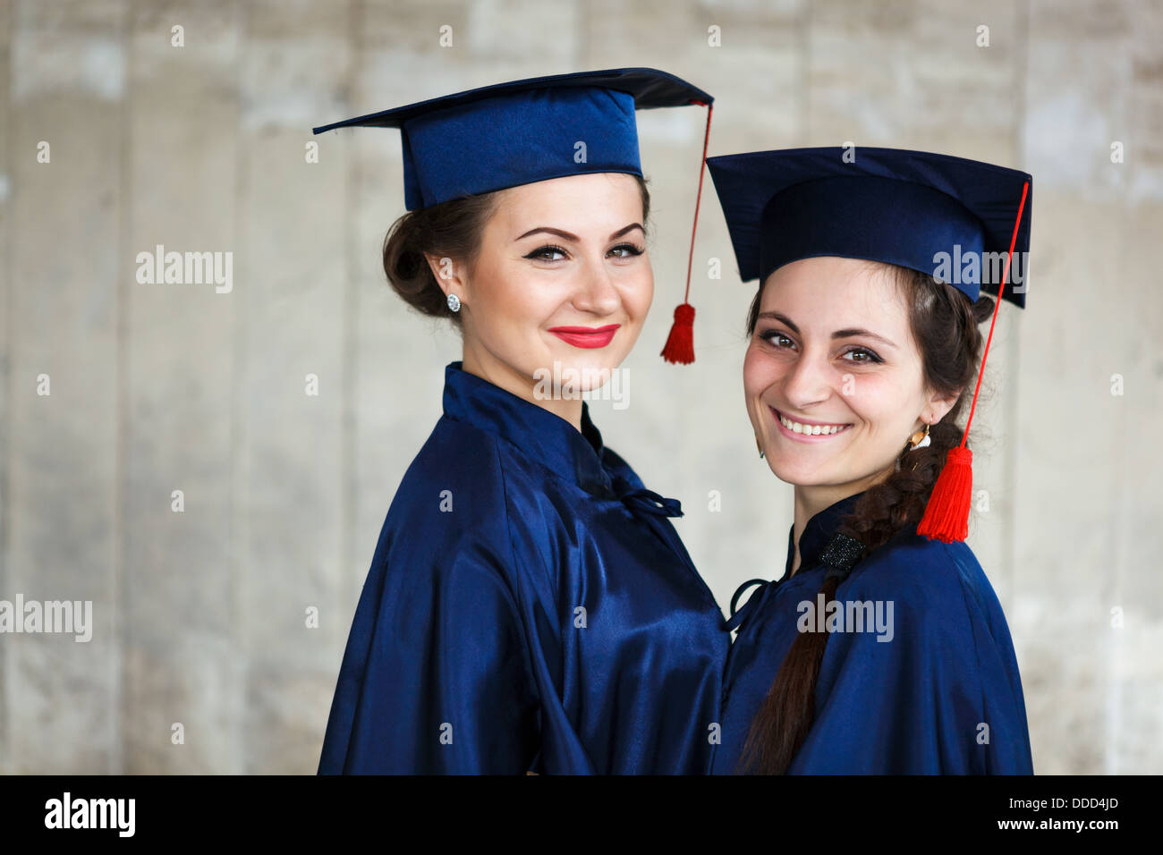 Image of a happy young graduates - outdoor shot Stock Photo - Alamy