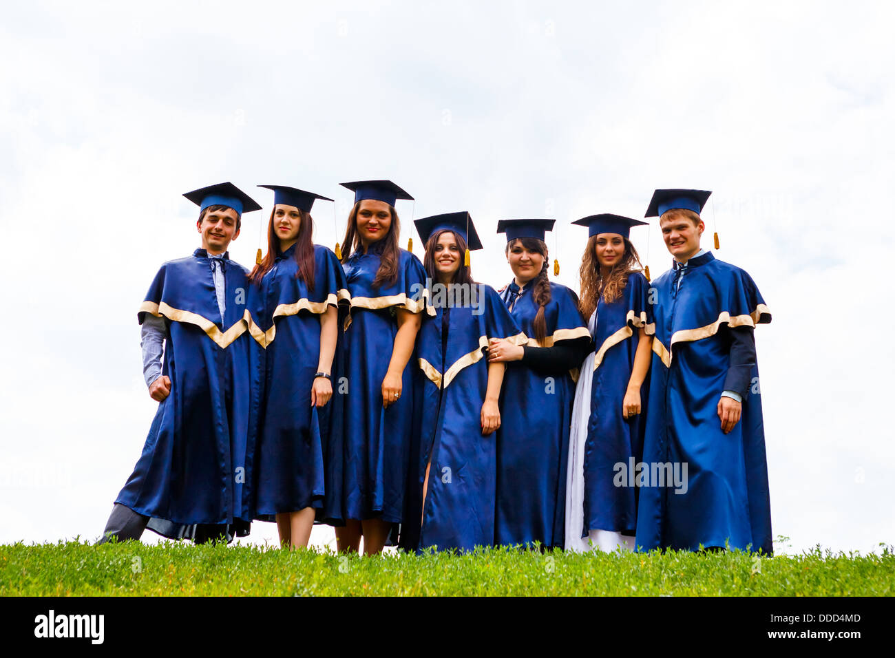 Image of happy young graduates - outdoor shot Stock Photo - Alamy