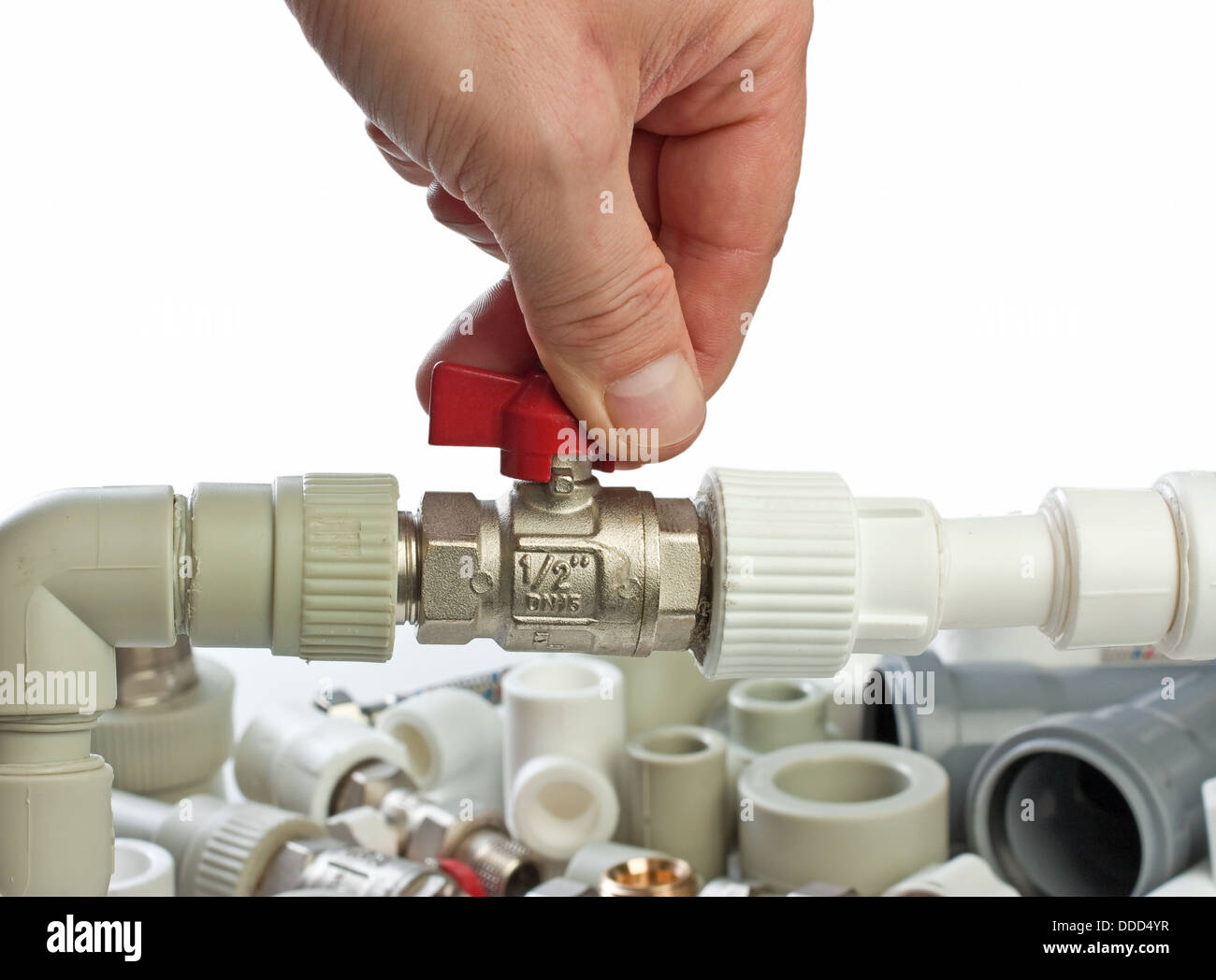Set plumbing fittings in his hand isolated on white background Stock ...