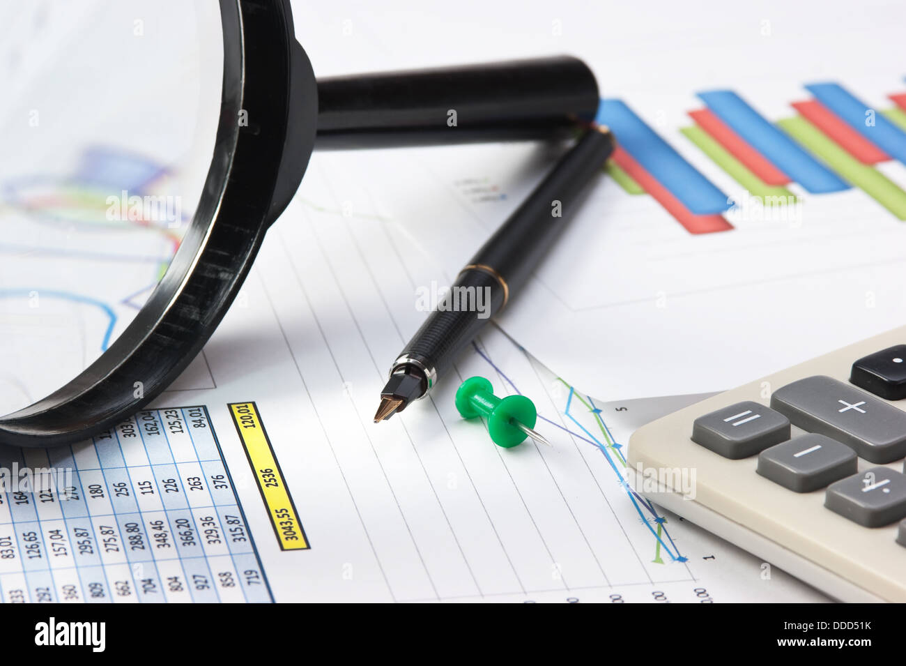 pen, magnifying glass and the working paper with a diagram Stock Photo ...