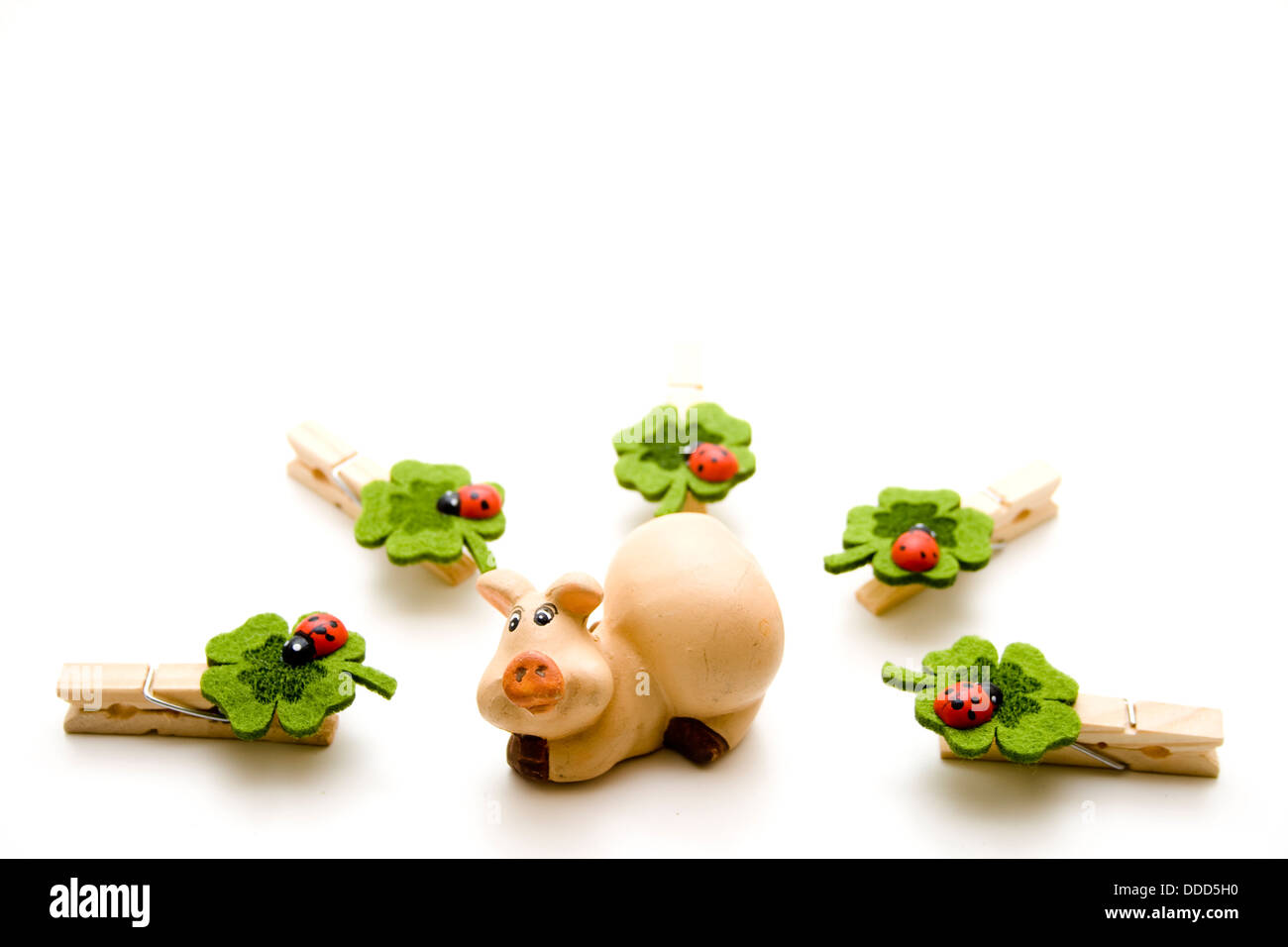 Ceramic pig with wooden clip Stock Photo - Alamy