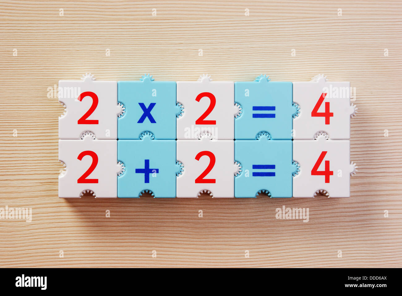 School cubes with math problems on the table Stock Photo - Alamy
