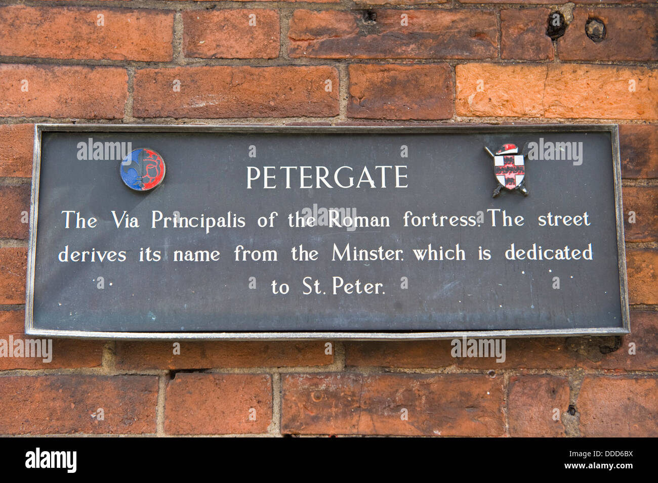 Heritage plaque for Petergate on wall in the city centre of York North ...
