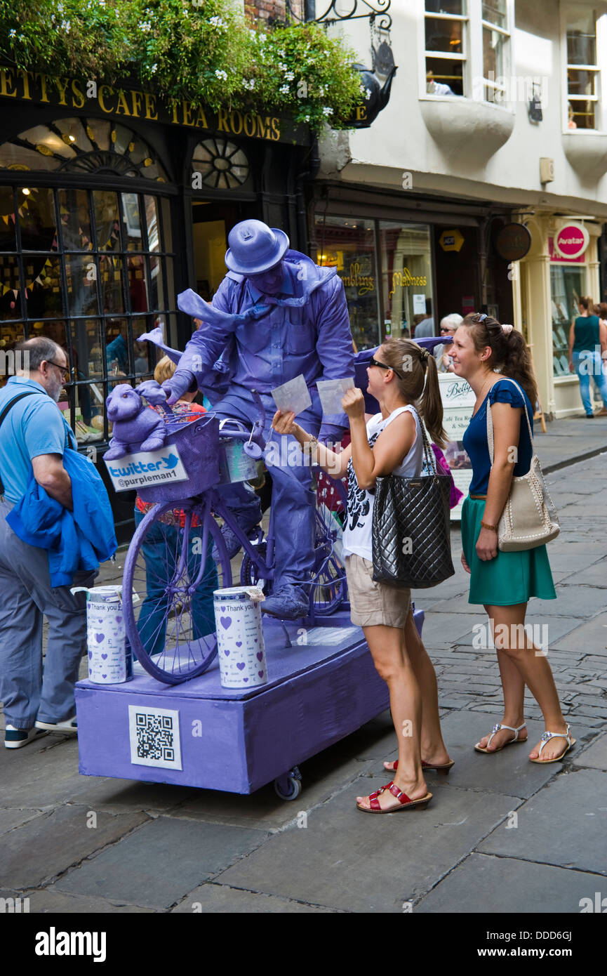 PURPLE MAN living statue in the city centre of York North Yorkshire ...