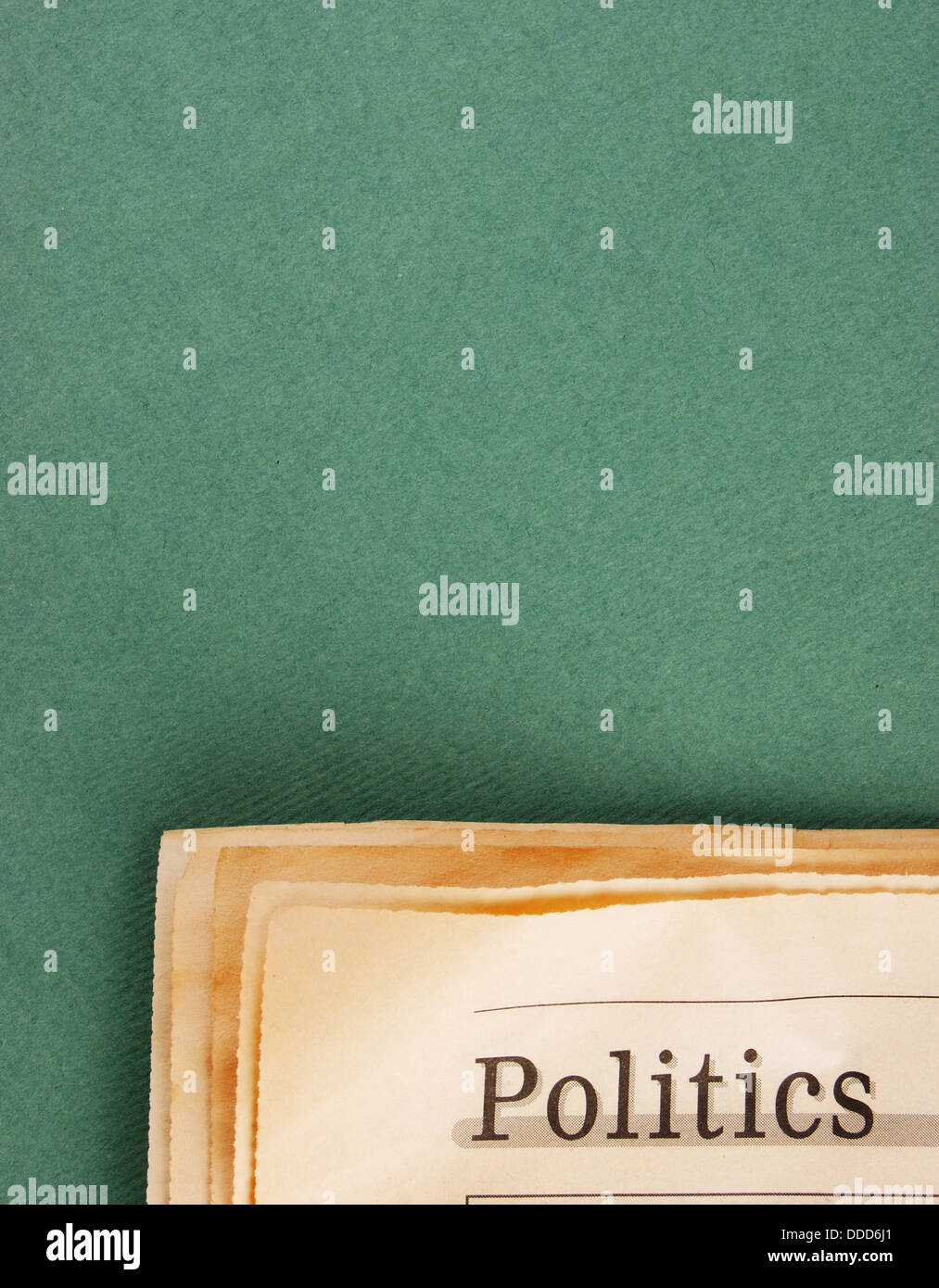 old newspaper on a green background Stock Photo - Alamy